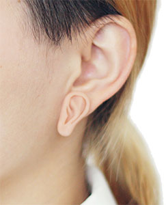 In one ear – Polymer Clay Daily